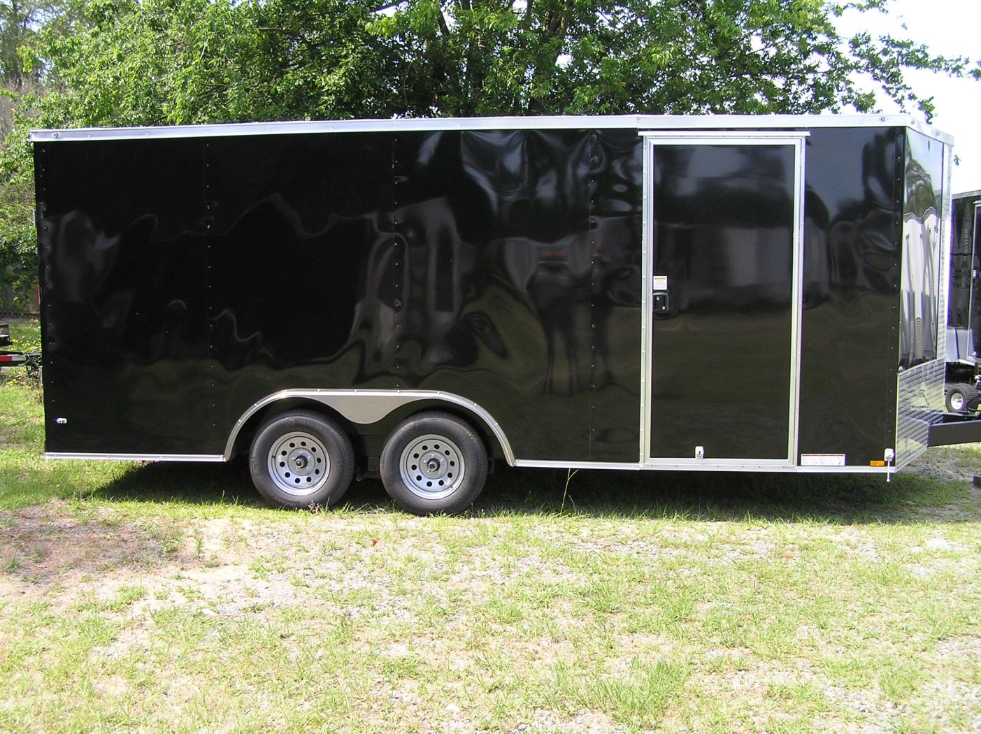 8.5×28 TA Trailer – Black, Ramp, Side Door, D-Rings, 7K Axles – Snapper Trailers